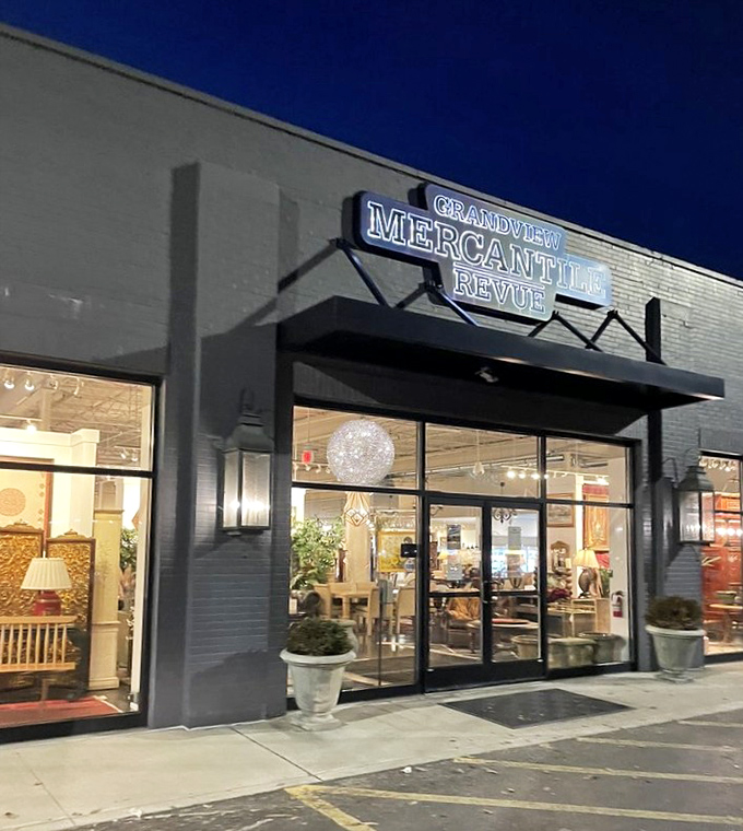 As night falls, the illuminated storefront transforms into a beacon for collectors, the warm glow promising discoveries that IKEA could never provide.