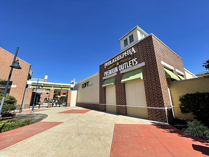 Brick facades and clean lines welcome bargain hunters to their retail playground. The LOFT sign beckons like a siren song to the fashion-conscious.
