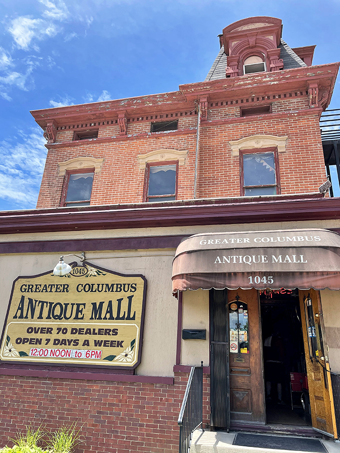 This historic brick fa&ccedil;ade isn't just pretty&mdash;it's a time portal disguised as a building, complete with that charming vintage awning.