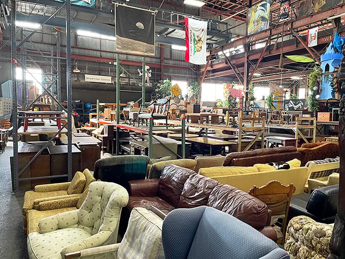 A sea of sofas awaits new homes, each with its own story to tell. That mustard yellow one? Definitely hosted some serious 1970s dinner parties.
