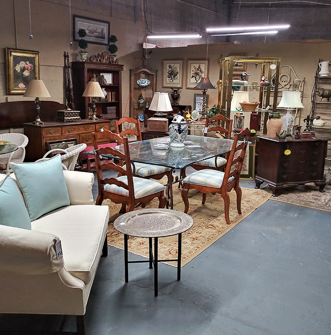 Not your average furniture showroom! This elegant dining set isn't waiting for delivery&mdash;it's patiently waiting for its second chapter in someone's home.