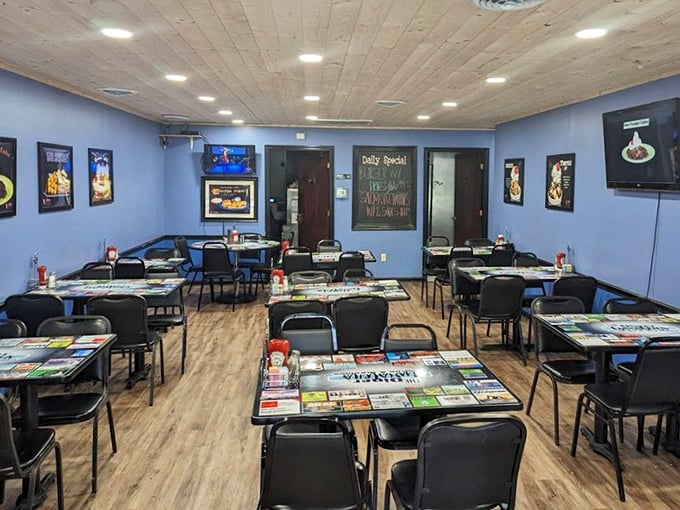 Blue walls and simple furnishings create a distraction-free zone where the food becomes the undisputed star of the show.