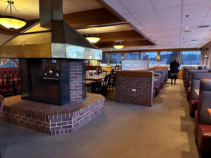 The heart of Sayler's &ndash; a cozy fireplace surrounded by burgundy booths where generations of Oregonians have celebrated life's big moments over perfectly cooked beef.