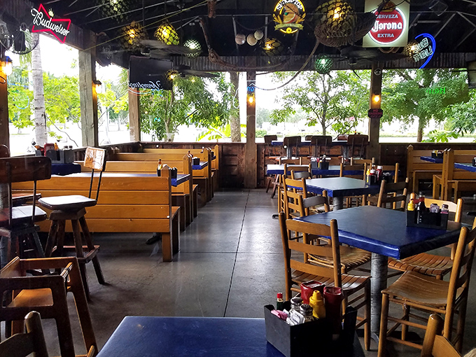 Wooden booths, simple tables, and beer signs create that perfect "come as you are" atmosphere where memorable meals happen without pretension.