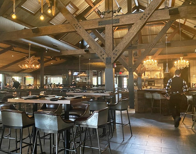 Exposed wooden beams and antler chandeliers create the perfect marriage of rustic and refined&mdash;like a cowboy who knows which fork to use first.