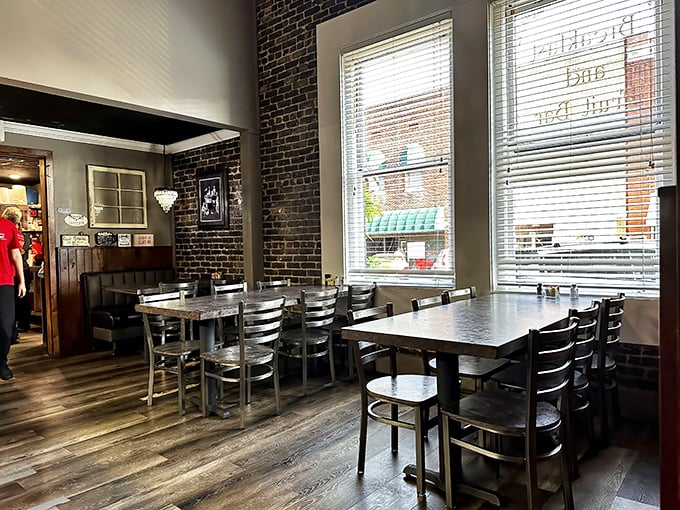 Exposed brick walls and metal chairs create that perfect small-town ambiance where conversations flow as freely as the coffee. No designer needed&mdash;just authentic Tennessee charm. 