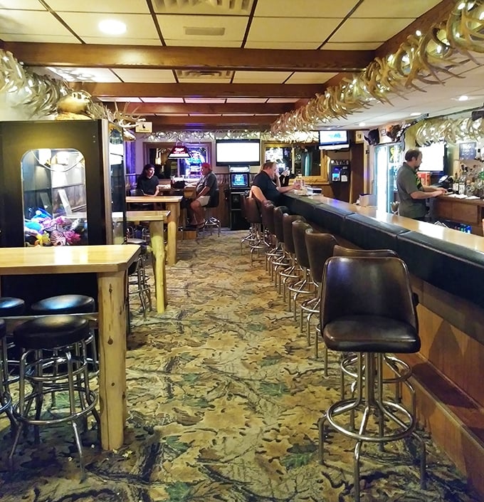 Step into Wisconsin supper club heaven where antlers line the ceiling, camouflage carpets the floor, and locals belly up to the bar for pre-dinner Old Fashioneds.
