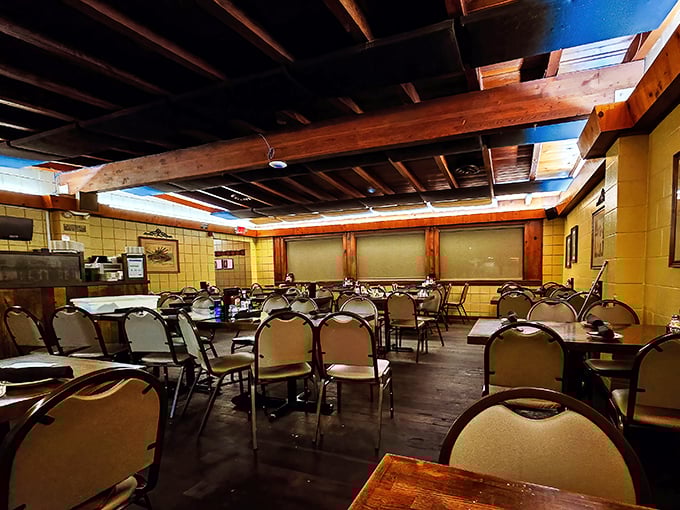 No designer lighting or trendy decor here&mdash;just honest wood beams, simple chairs, and the promise of meat magic about to happen.