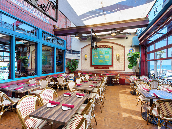 Bistro-style seating, wicker-backed chairs, and ocean views create that perfect California casual-elegant vibe where you can be comfortable whether wearing flip-flops or business attire.