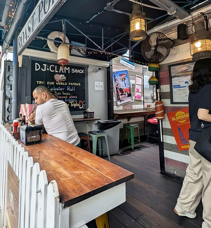 Inside DJ's, nautical charm meets culinary magic. Those hanging lanterns aren't just for show&mdash;they're illuminating seafood greatness.