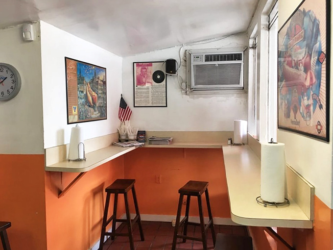 Cozy counter seating and vintage hot dog art create a time capsule of Americana where calories don't count and nostalgia flows freely.