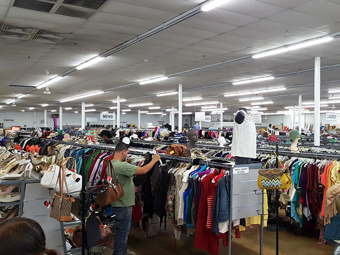 Endless racks of possibility stretch to the horizon. The Narnia of secondhand shopping awaits beyond these fluorescent lights.