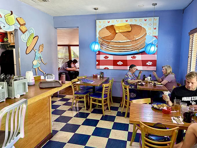 Blue walls, whimsical pancake art, and that classic checkered floor&mdash;this isn't just a restaurant, it's breakfast's natural habitat.