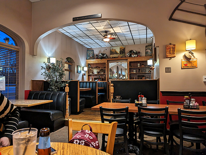 Warm lighting, wooden accents, and cozy booths create the perfect backdrop for food that's about to steal the spotlight.