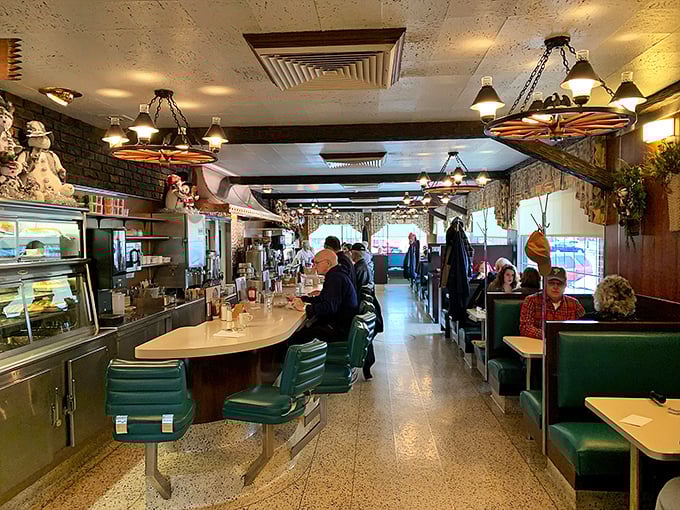Step inside and time slows down. The counter with its teal vinyl stools has witnessed countless coffee refills and life stories exchanged between neighbors and strangers alike.
