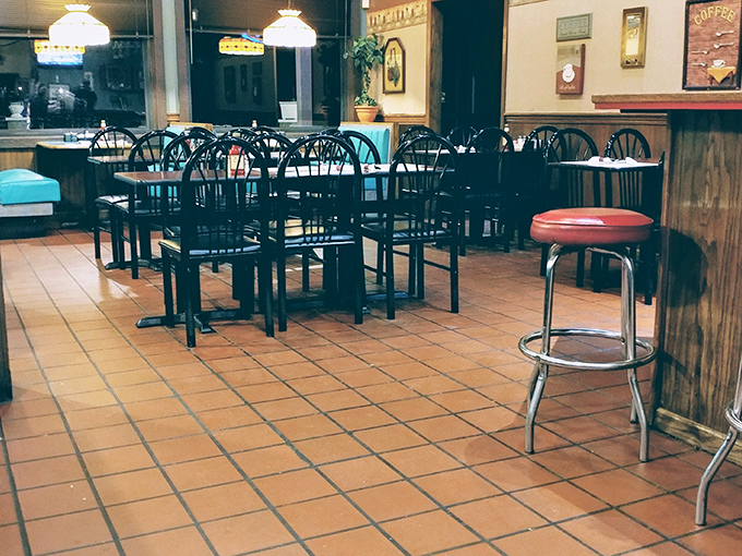 Inside, terra cotta tiles and wood paneling create that perfect "come as you are" atmosphere where calories don't count and coffee refills flow freely.