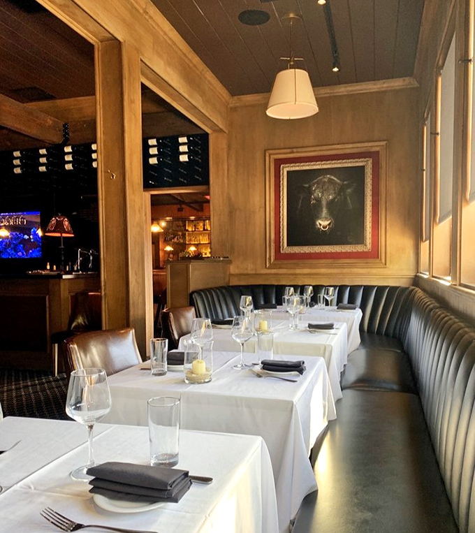 Leather banquettes, crisp white tablecloths, and that perfect golden lighting &ndash; this isn't just dinner, it's dinner and a show starring you.