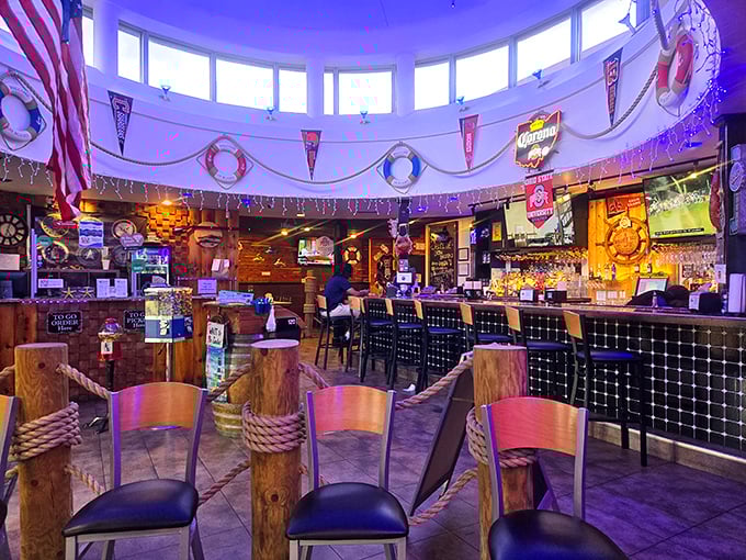Imagine Bourbon Street and a fishing wharf had a baby, then decorated it with college pennants and life preservers. The circular design creates a communal vibe that makes strangers feel like neighbors. 