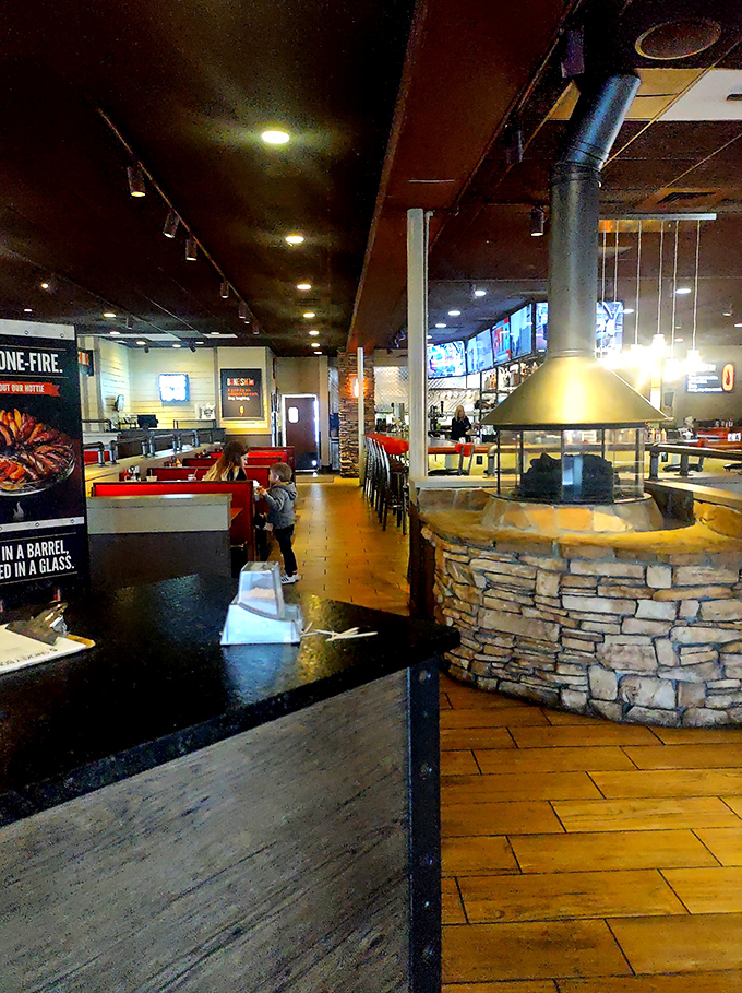 That central stone fireplace isn't just for show&mdash;it's the beating heart of the restaurant, a monument to mankind's greatest discovery: cooking with fire.