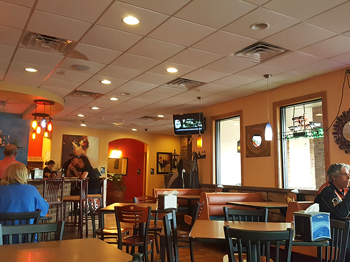 The warm glow of JoJo's interior doesn't just light up the room&mdash;it lights up your day. Cozy booths and golden walls create the perfect backdrop for pizza epiphanies.