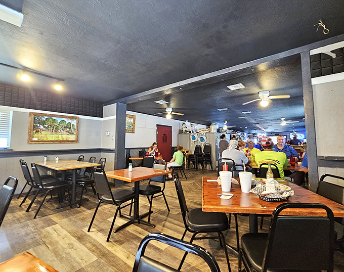 Inside, wooden tables and simple d&eacute;cor create that rare atmosphere where conversations flow as freely as the sweet tea.