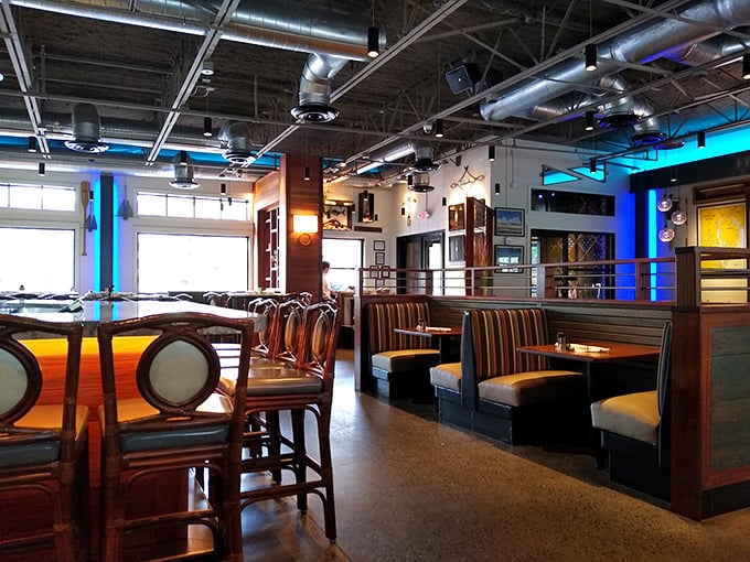 Elegant arches and herringbone floors create a parlor that whispers of Victorian secrets &ndash; the kind of room where Sherlock Holmes might solve a mystery.