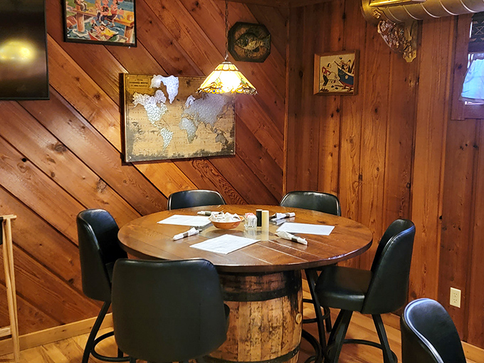 Whiskey barrel tables and knotty pine walls create that perfect "cabin in the woods" vibe. Comfort starts before the food even arrives.