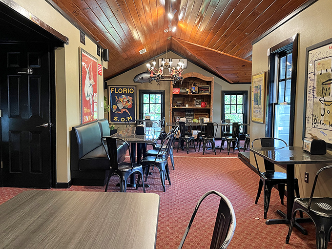 Step inside and you're transported to a cozy attic hideaway where vintage posters and wooden ceilings create the perfect sandwich-eating sanctuary.