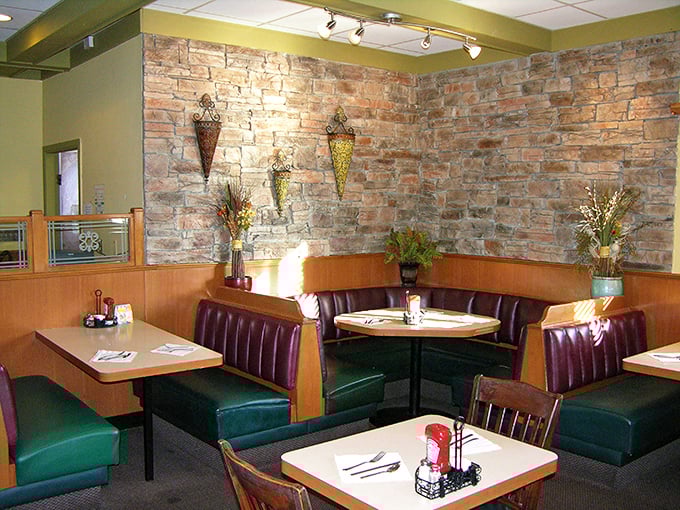 Cozy booths and exposed brick create the perfect backdrop for breakfast conspiracies. "Should we split the pancakes AND the French toast?" The answer is always yes.