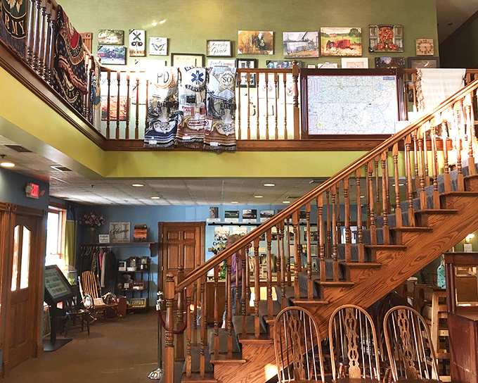 That staircase isn't just architectural charm—it's a pathway to food heaven. The warm wooden interior practically whispers "stay awhile."