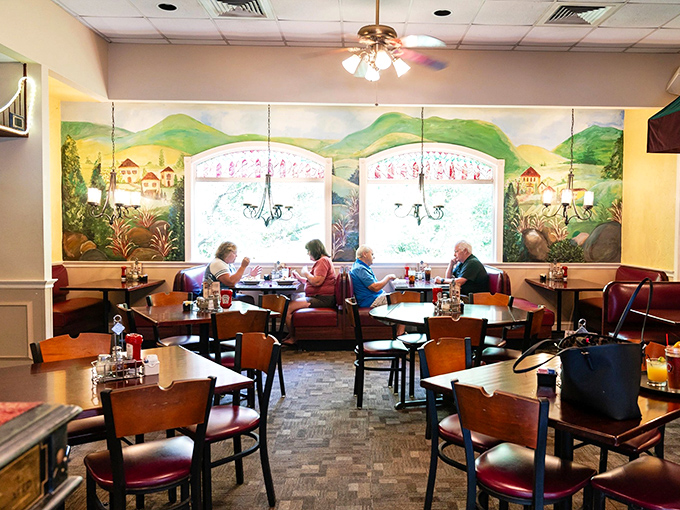 The dining room's landscape murals transport you to the Italian countryside while burgundy booths cradle you like a pasta-loving grandparent. 