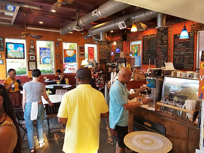 Inside, the exposed brick and colorful artwork create that perfect "third place" vibe—not home, not work, but somewhere you actually want to be.