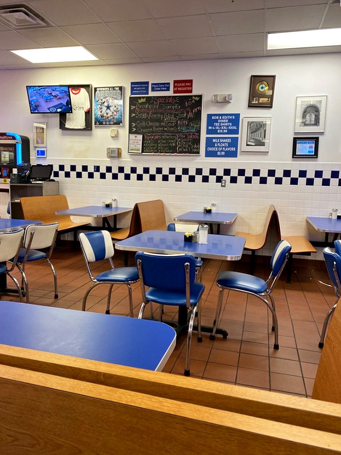 Classic blue vinyl chairs and checkered tiles—this isn't retro by design, it's authentic by persistence. Some things just shouldn't change.