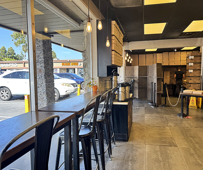 Modern industrial meets donut sanctuary – the perfect spot to contemplate life's important questions, like "How many is too many?"