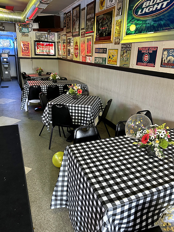 Classic black and white checkered tablecloths and walls of memorabilia create that perfect "come as you are" neighborhood tavern atmosphere.