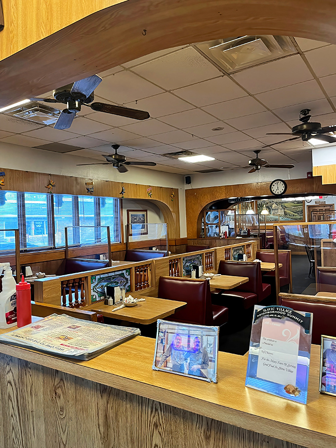 Classic wood paneling and comfortable booths create that perfect diner atmosphere where conversations flow as freely as the coffee.