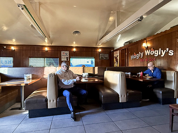 Wood-paneled walls and comfy booths create the perfect no-nonsense setting for the serious business of BBQ appreciation.