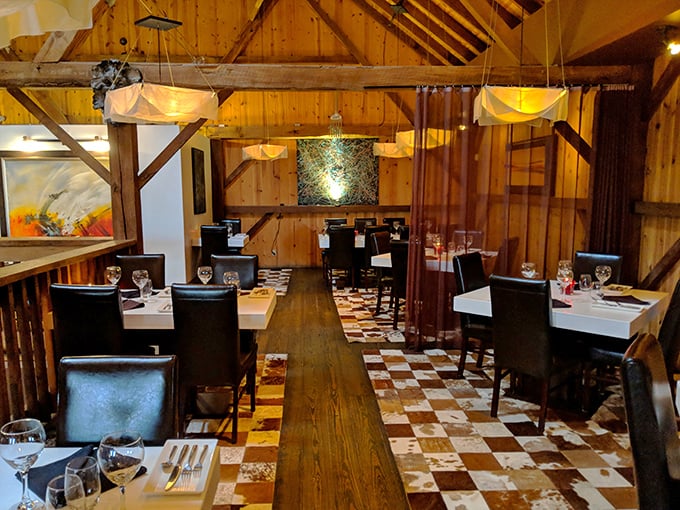 Exposed beams and checkerboard floors create dining drama. This isn't just a restaurant&mdash;it's dinner theater where the food steals the show.