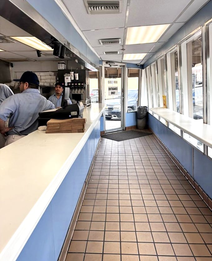 Inside Johnnie's, no-frills is the philosophy. This narrow corridor to sandwich heaven prioritizes efficiency over elbow room&mdash;exactly as it should.