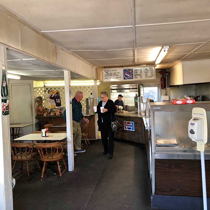 Inside B's, time stands still. Wooden chairs, simple counters, and the promise of Eastern Carolina barbecue perfection await the patient pilgrim.