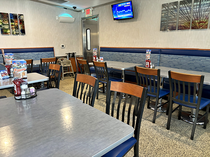 Step inside where vinyl booths and counter stools create the perfect stage for serious breakfast conversations and coffee refills.