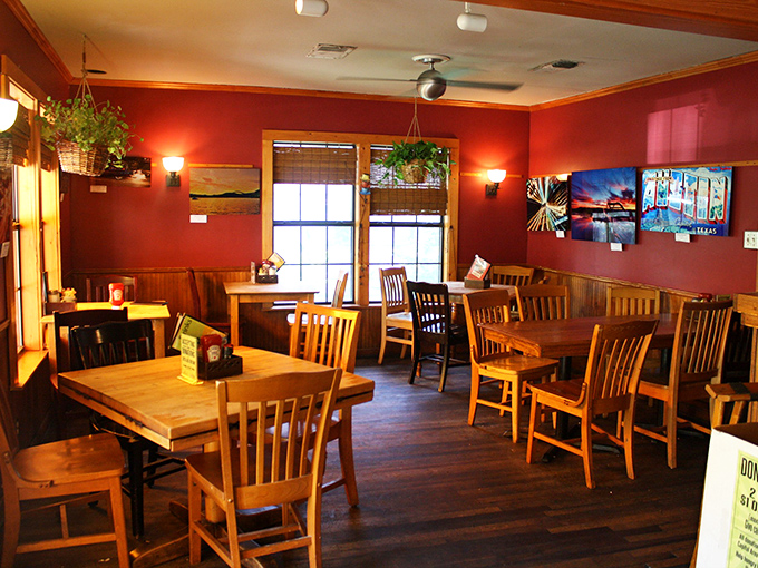 Inside, warm wood tones and deep red walls create that perfect balance of cozy and energizing – like your favorite sweater but in restaurant form.