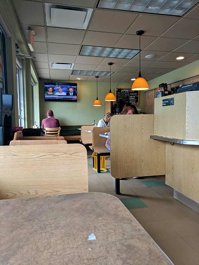 Cozy wooden booths and warm orange pendant lights create that "everybody knows your name" feeling, minus the bar tab and regrettable karaoke.