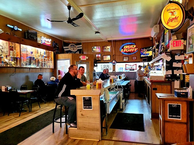 Inside this wood-paneled time capsule, locals and travelers alike gather at the altar of fried bologna perfection.