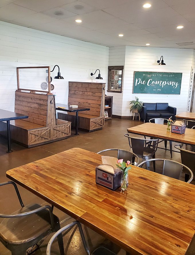 Modern farmhouse meets pie sanctuary inside, where rustic wooden tables and white shiplap walls create the perfect backdrop for life-changing dessert decisions.