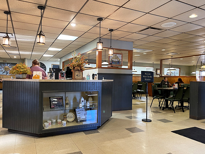Step inside and breathe in that classic American diner atmosphere. The pendant lights cast a warm glow that says, "Stay awhile, calories don't count here."