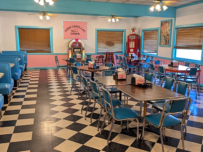 Step inside and you're instantly transported to the 1950s, complete with checkered floors, blue vinyl booths, and that unmistakable diner energy.