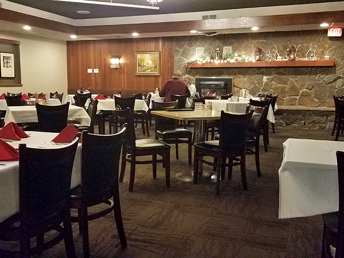 Wood paneling and white tablecloths create that perfect time-warp feeling. This isn't trendy dining&mdash;it's timeless dining, where conversations matter more than Instagram posts.