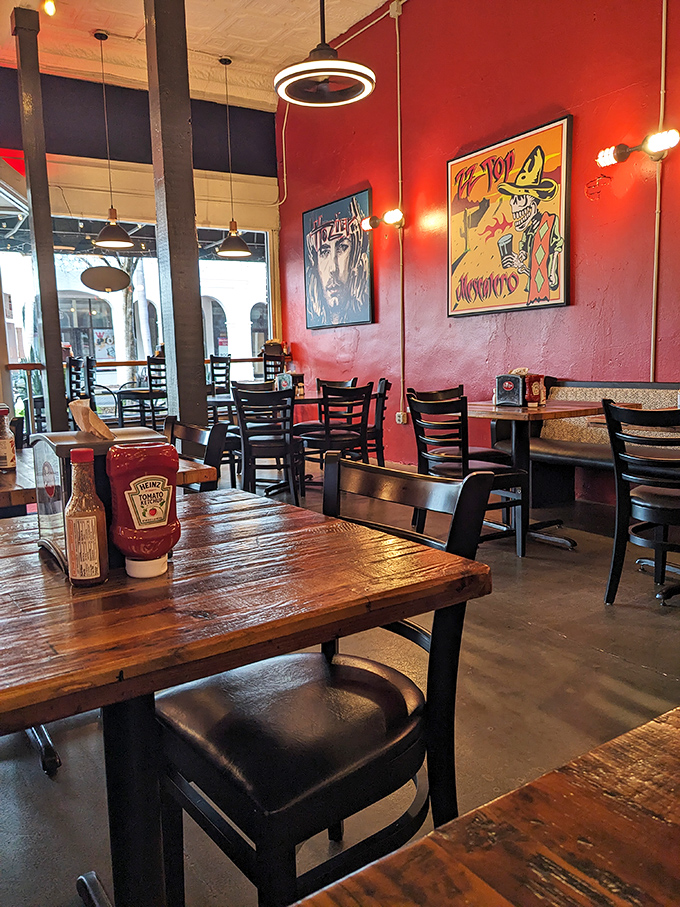 Red walls, wooden tables, and eclectic art create the perfect backdrop for burger bliss. This isn't just dining&mdash;it's a flavor sanctuary.