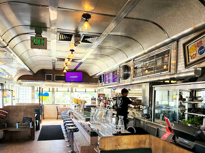 The curved ceiling and gleaming counter transport you to simpler times, when conversations flowed as freely as the coffee and nobody was staring at their phones.